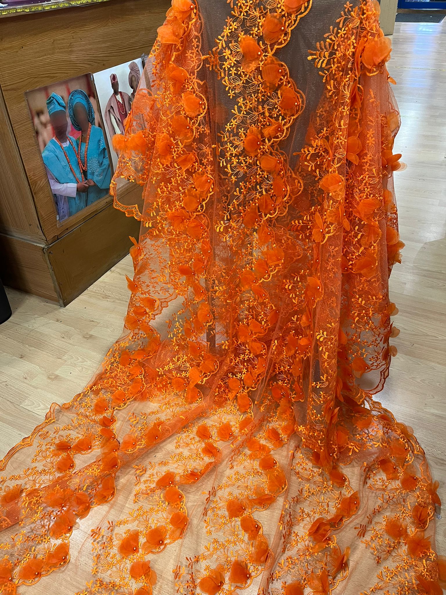 Orange lace material store